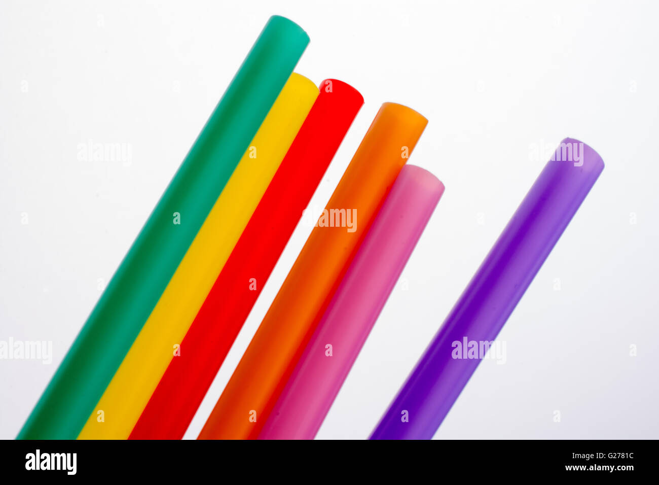 different color of straw on a white background Stock Photo - Alamy