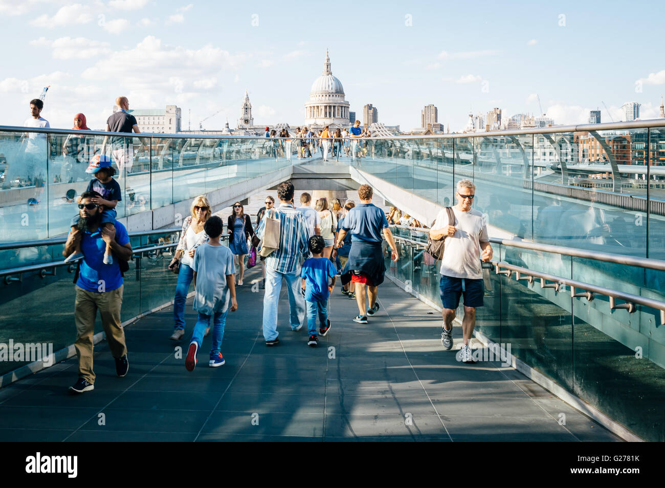 People walking over bridge hi-res stock photography and images - Alamy