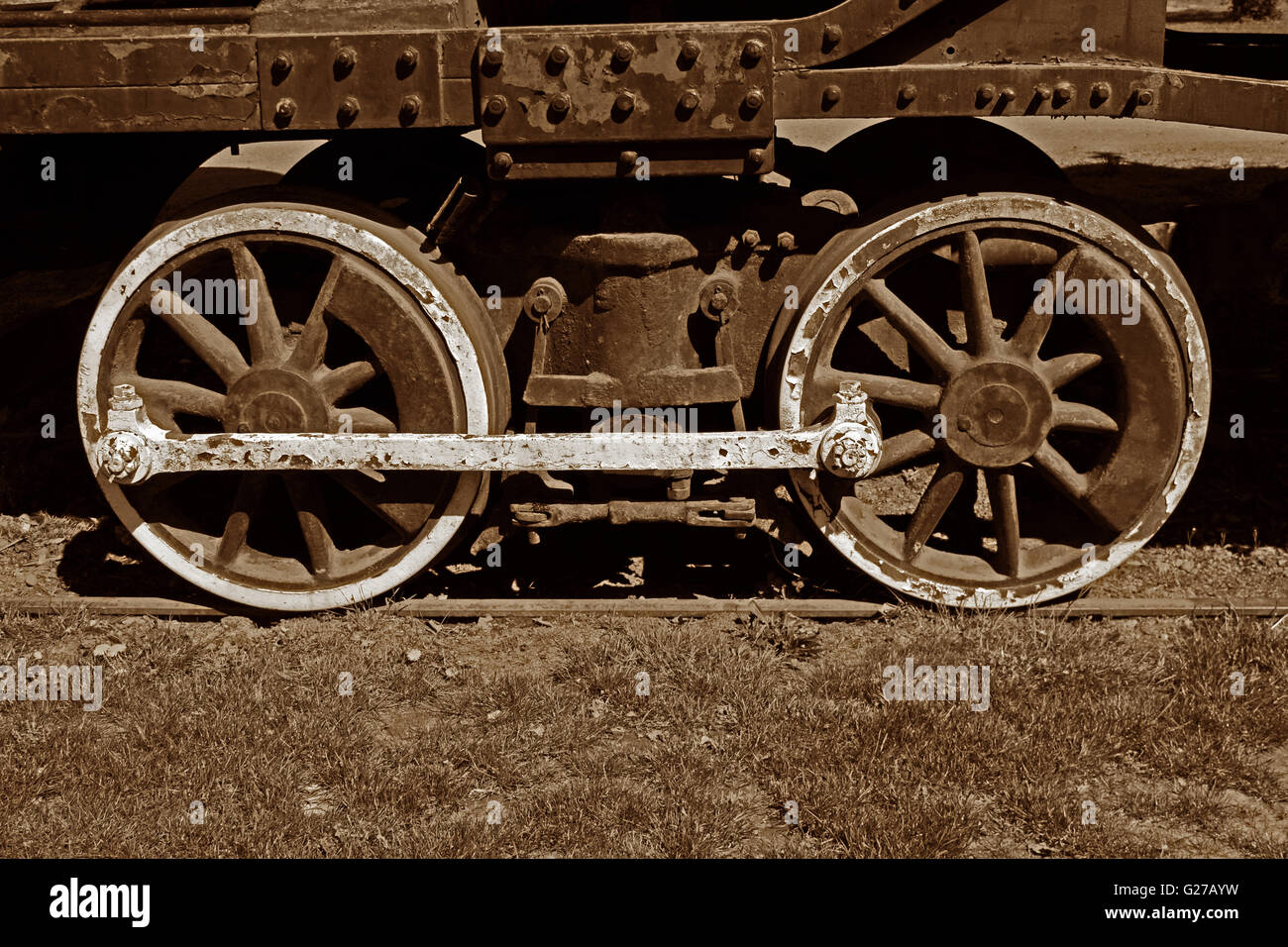 Sepia picture of steam locomotive wheels Stock Photo - Alamy