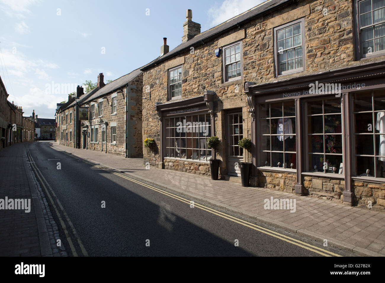 Norma James and other shops on Main Street in Corbridge, England. The ...