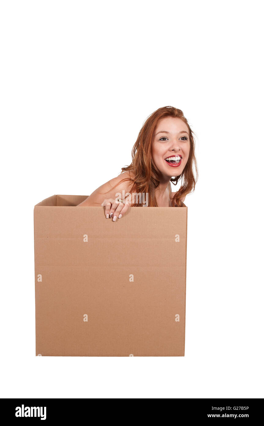 Beautiful woman thinking outside of the box Stock Photo - Alamy