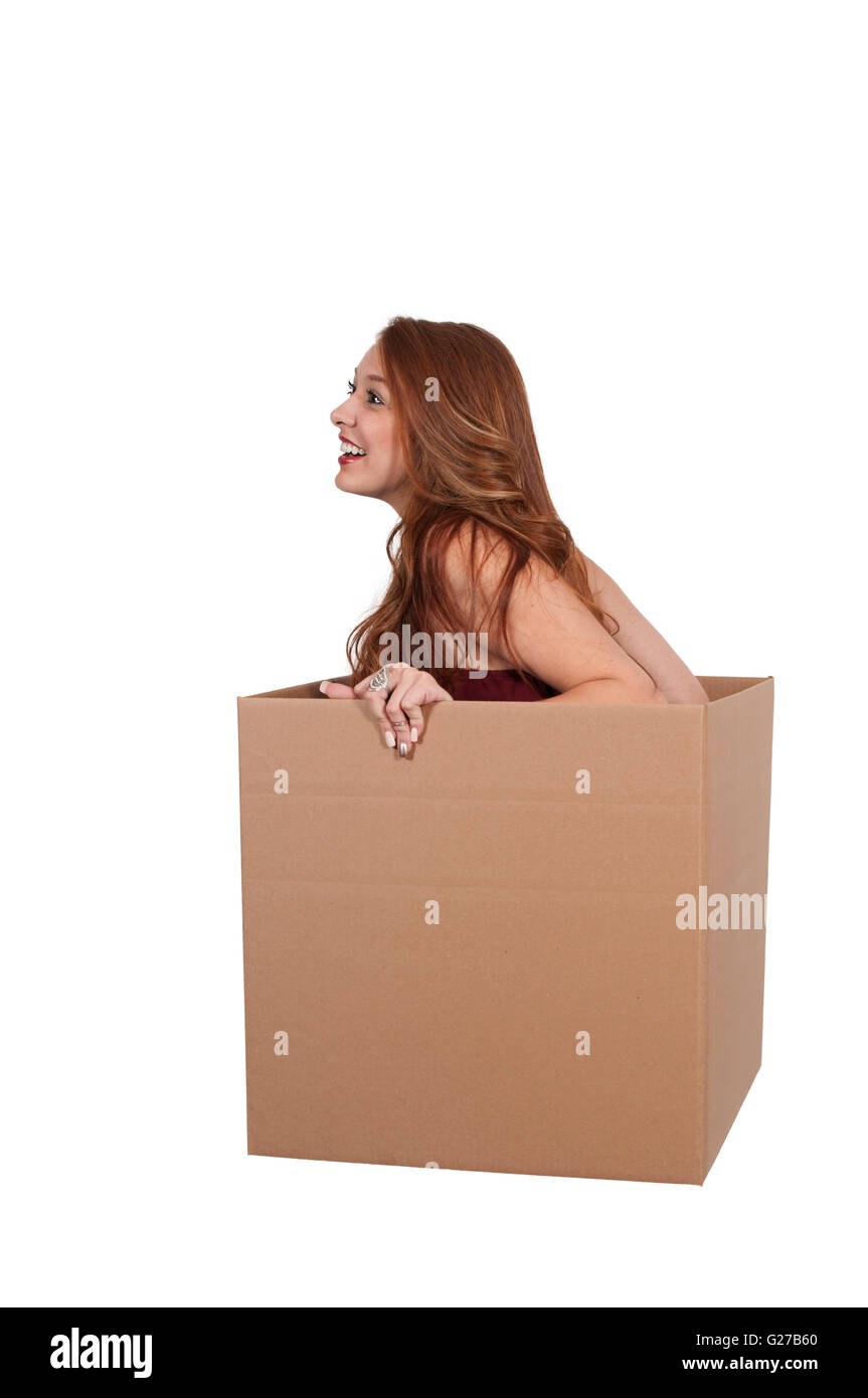 Beautiful woman thinking outside of the box Stock Photo - Alamy