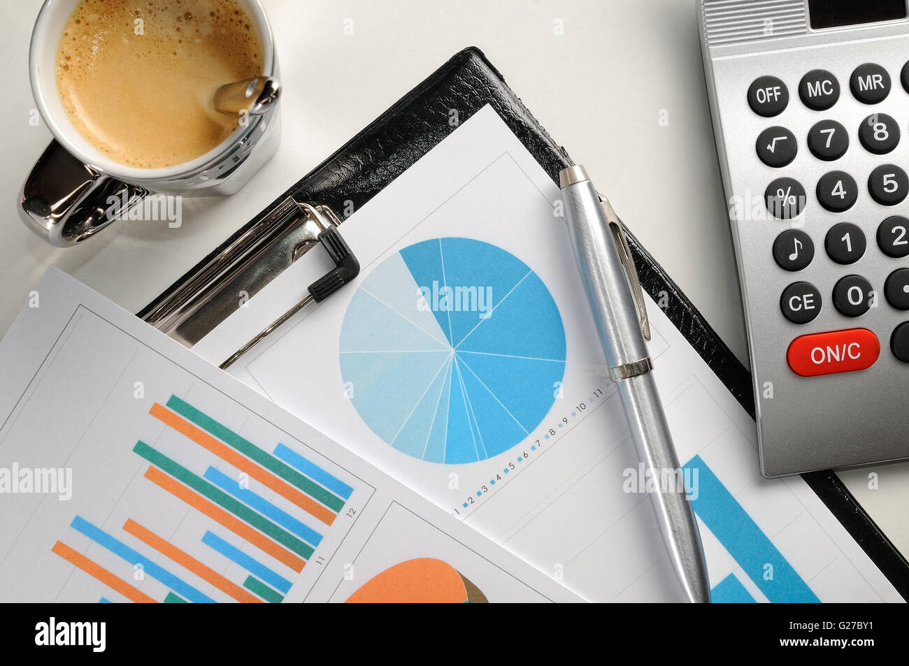 Financial graphs and charts analysis top view Stock Photo - Alamy