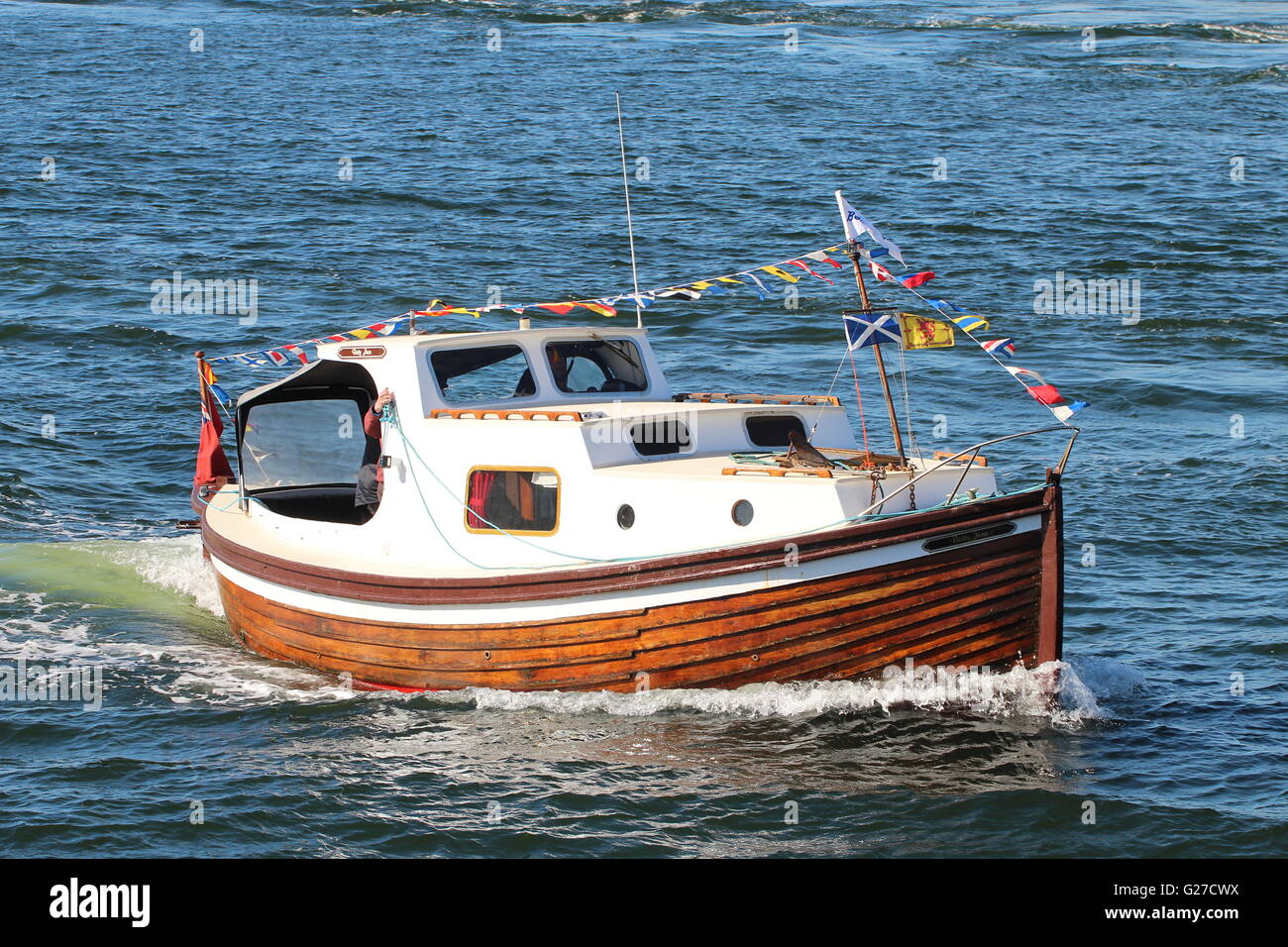 Betty Jean, a clinker-built cruiser, was part of the welcoming flotilla ...