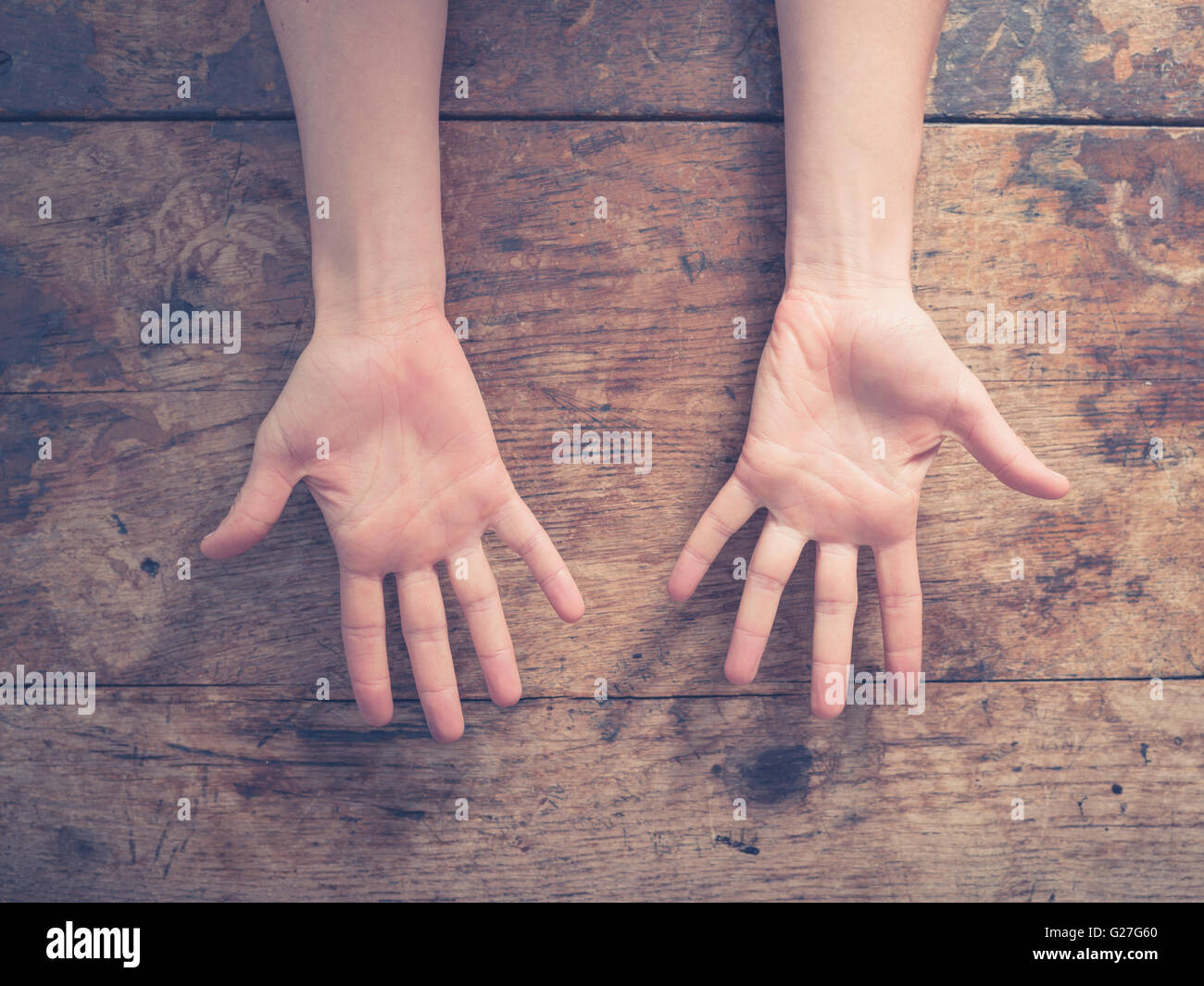 Woman showing hand palms hi-res stock photography and images - Alamy