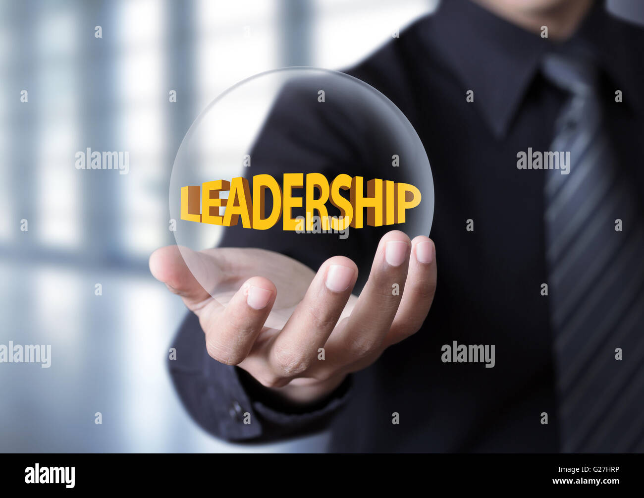 Leadership symbol in businessman hand, Businessman showing "Leadership ...