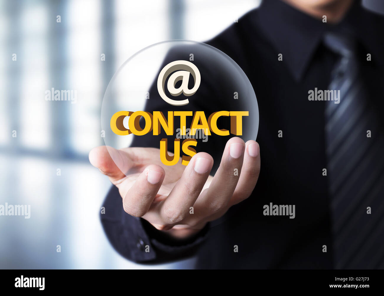 Contact us symbol in businessman hand, Businessman showing "contact us ...