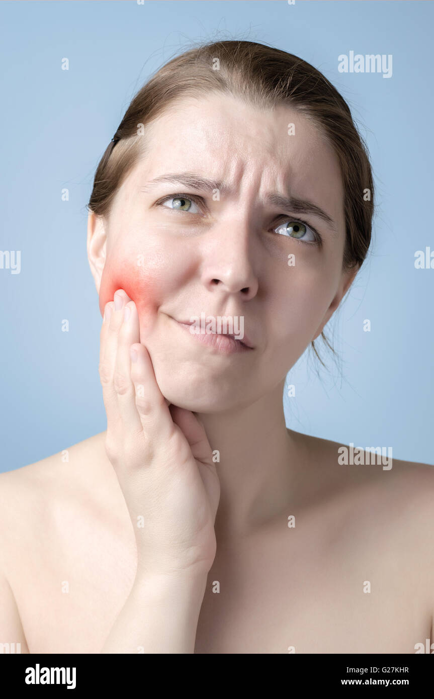 Young woman suffering from toothache Stock Photo - Alamy