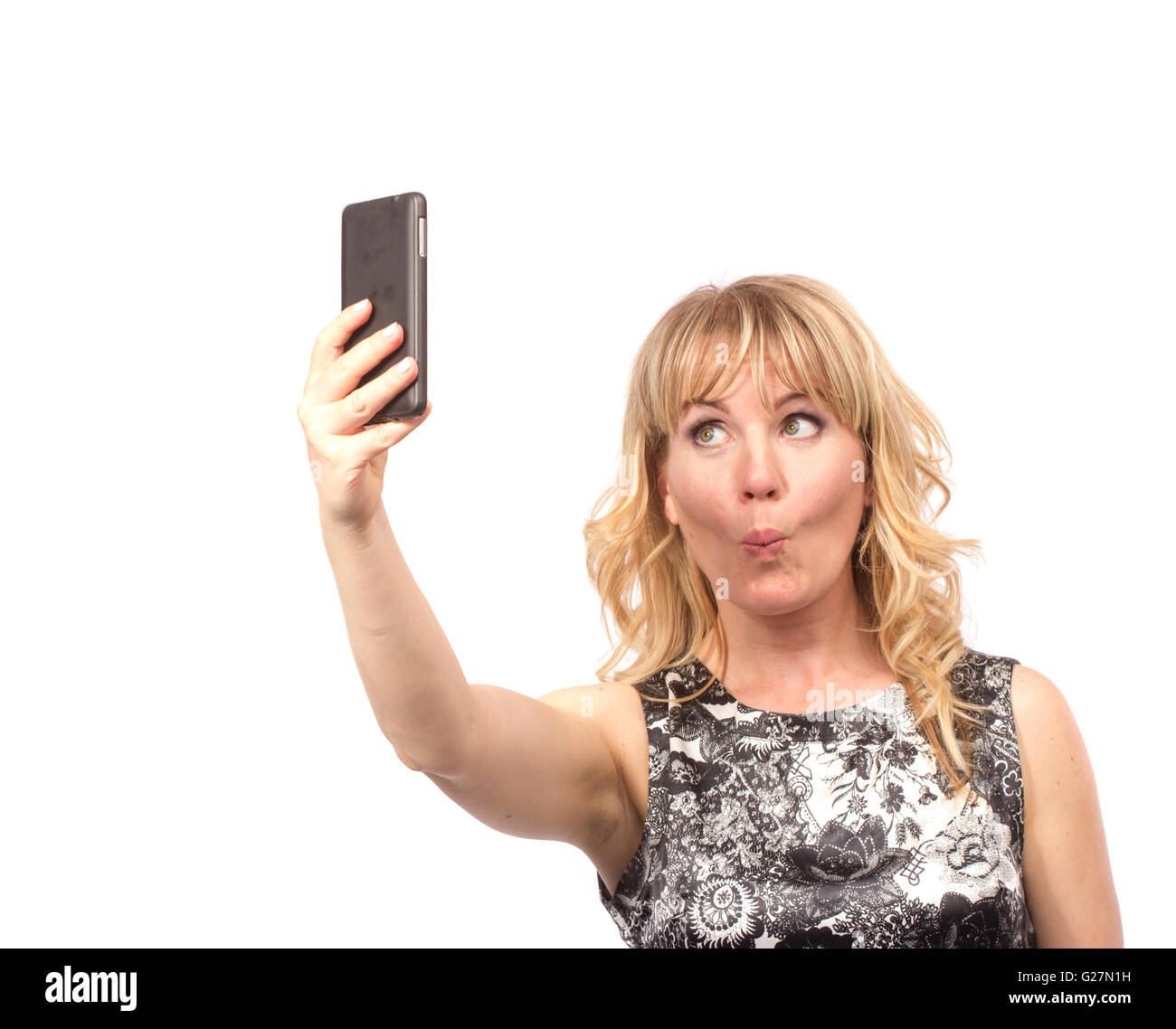 Beautiful woman taking self picture with smartphone camera. Isolated on ...