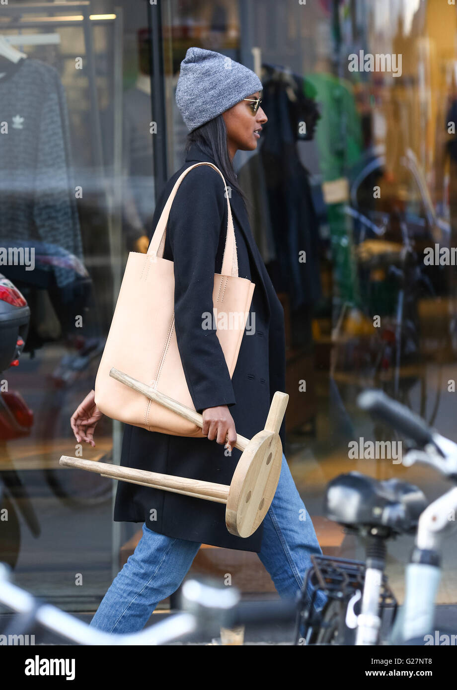 Sara Nuru carrying a wooden chair whilst leaving Indulge House in Mitte ...