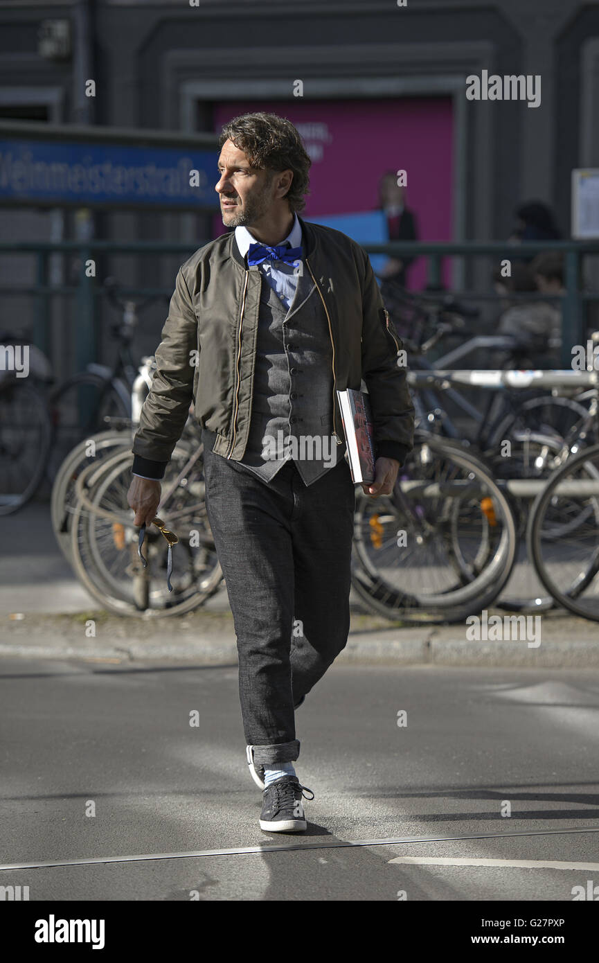 German actor Falk Willy Wild out and about with a book in Mitte ...