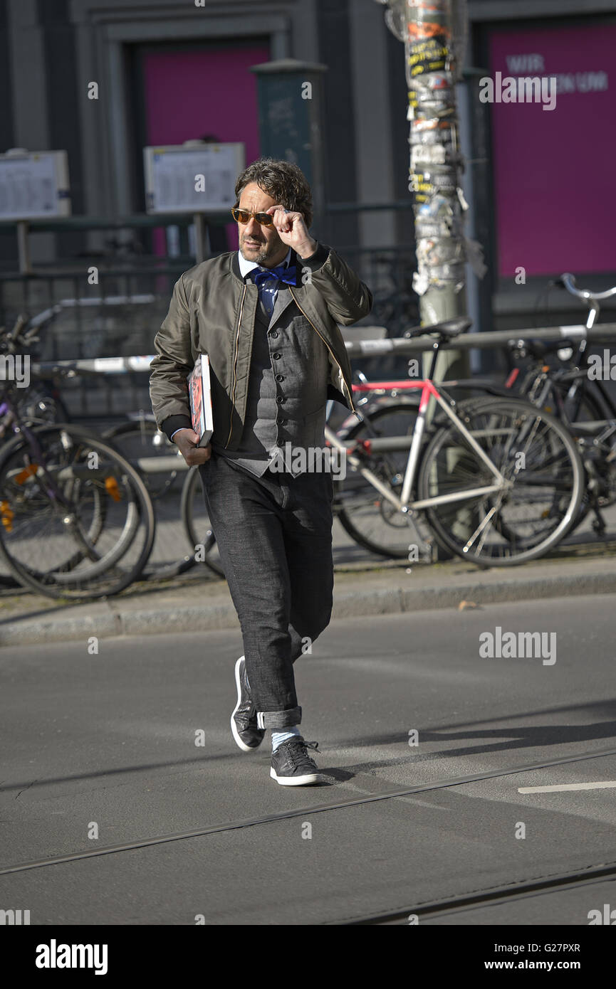 German actor Falk Willy Wild out and about with a book in Mitte ...