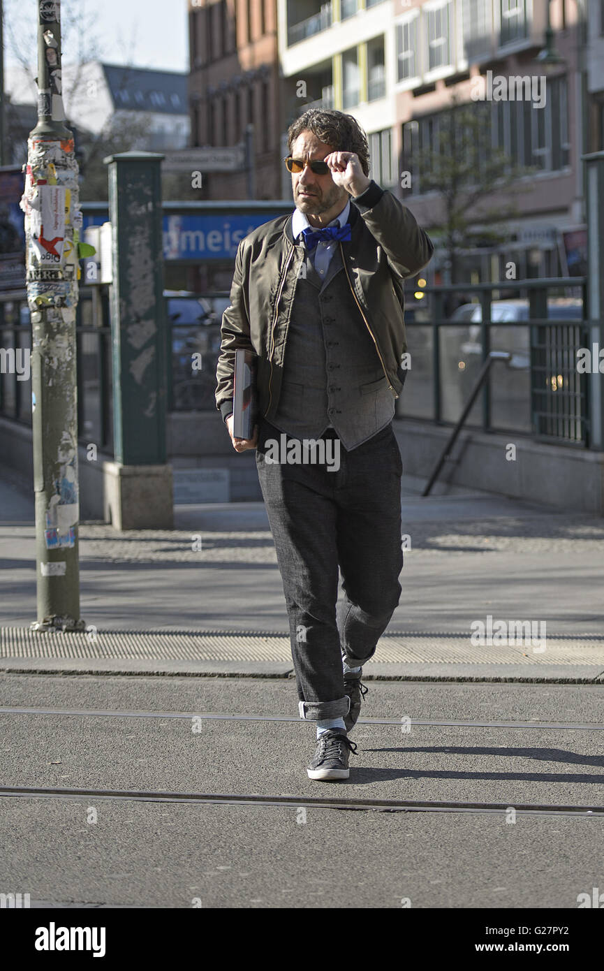 German actor Falk Willy Wild out and about with a book in Mitte ...