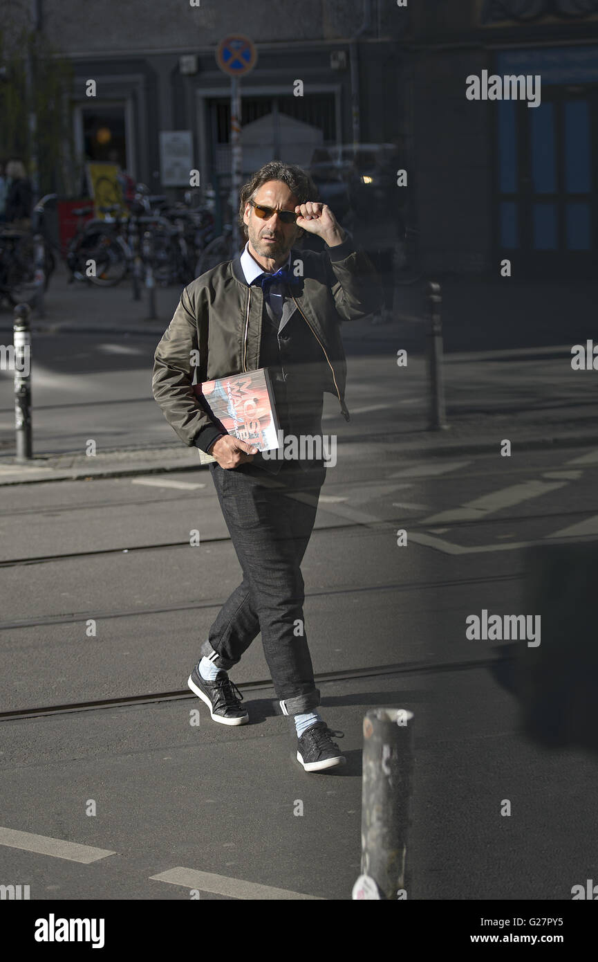 German actor Falk Willy Wild out and about with a book in Mitte ...