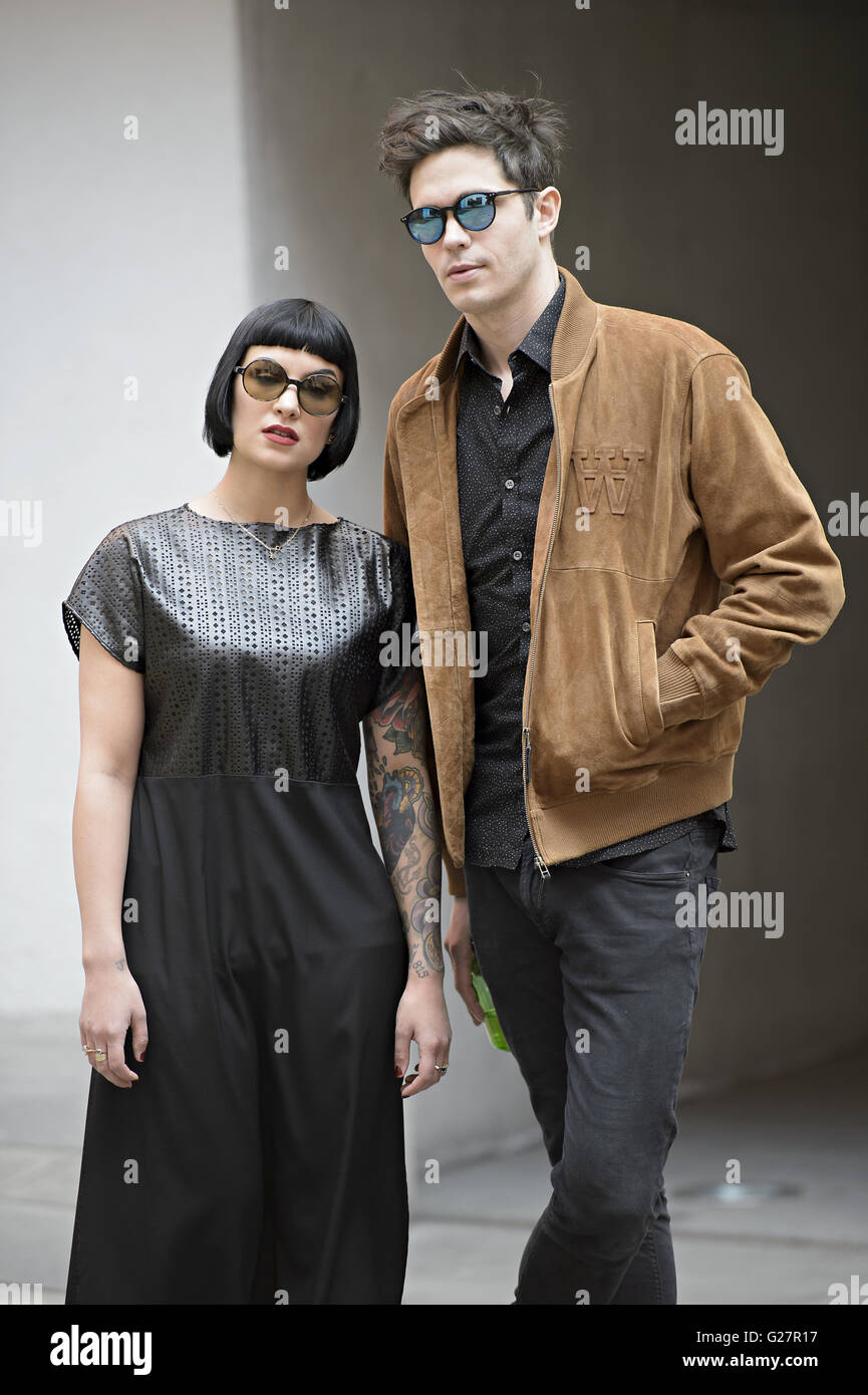 Nessi and her guitarist Andrew Tyler posing for photos outside Indulge ...