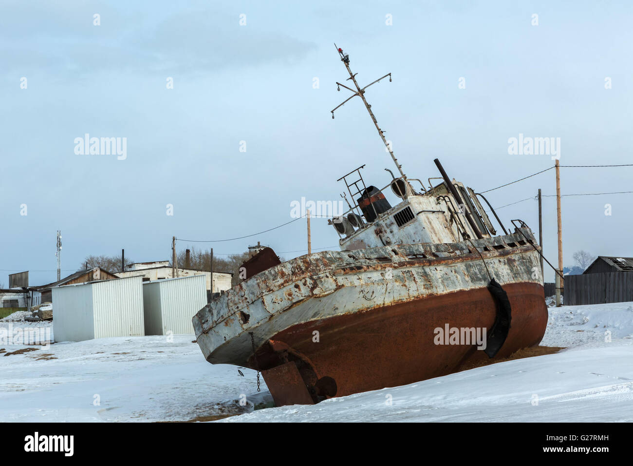 Old rusty ship on winter shore of Lake Baikal Stock Photo - Alamy
