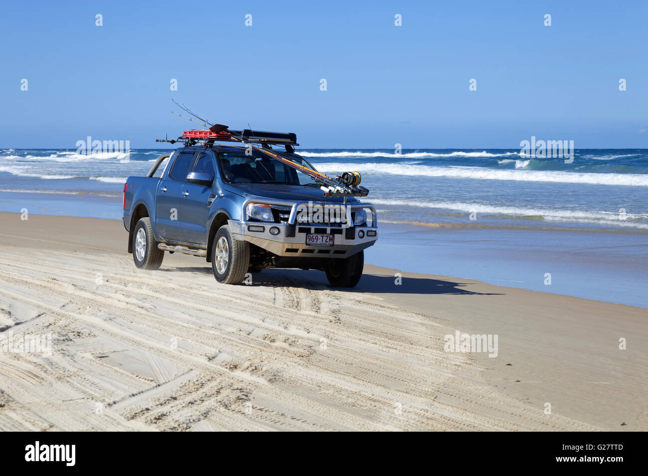 Car on 75 Mile Beach Road, official Highway, UNESCO World Heritage Site ...