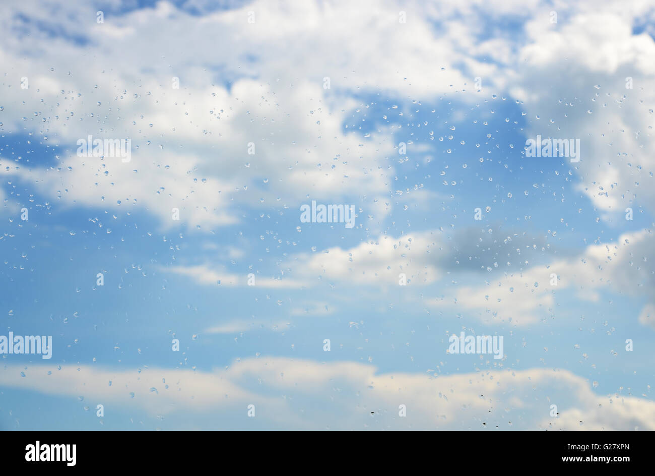 Raindrops on a window.Through the glass sky and clouds Stock Photo - Alamy