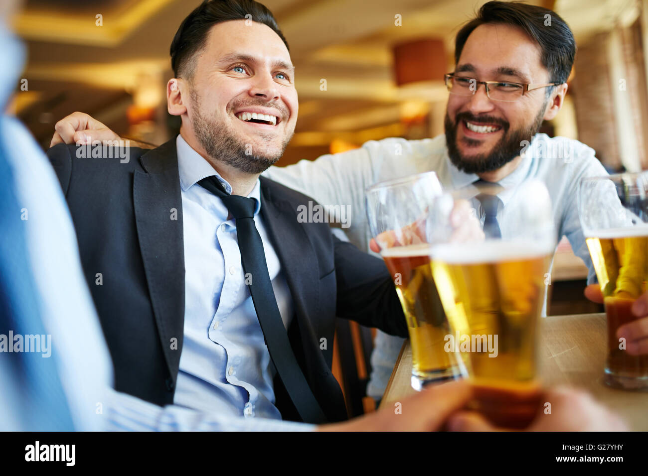 Talking by beer Stock Photo - Alamy