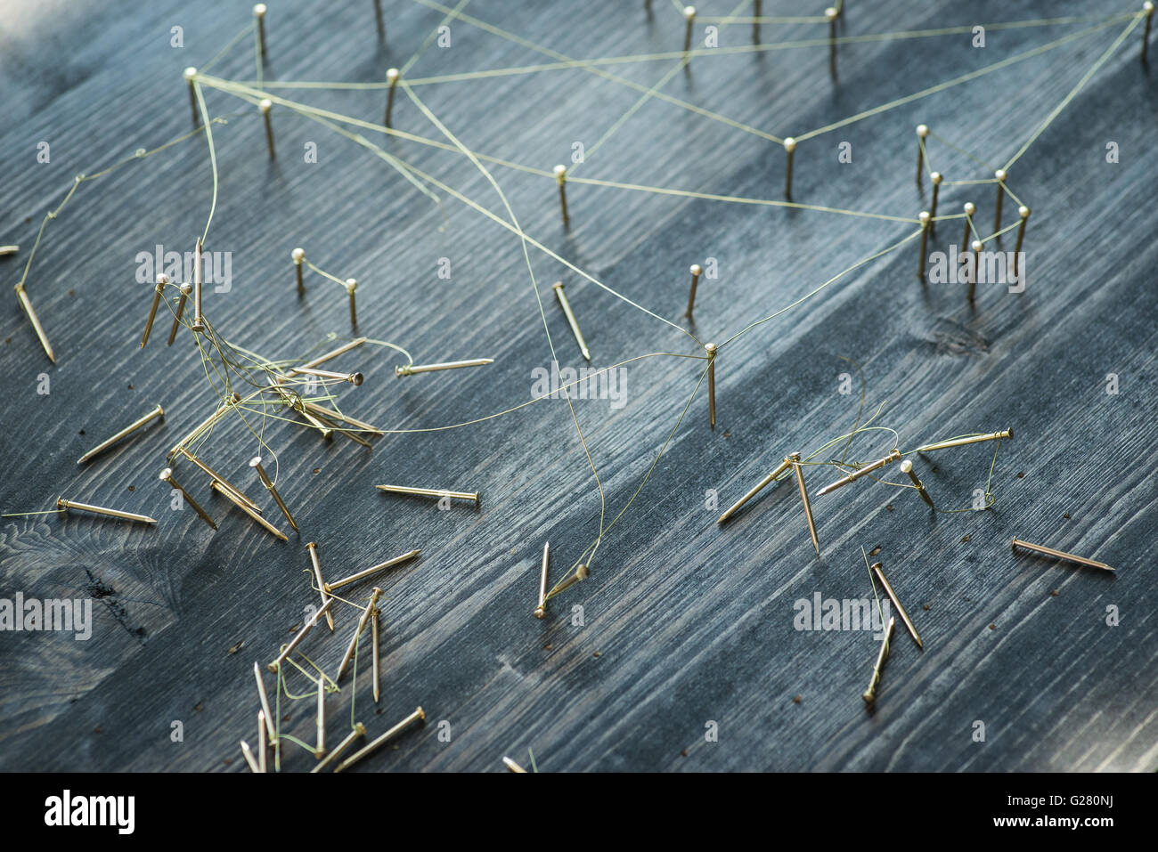 Web of wires, showing broken connections between groups and individuals ...