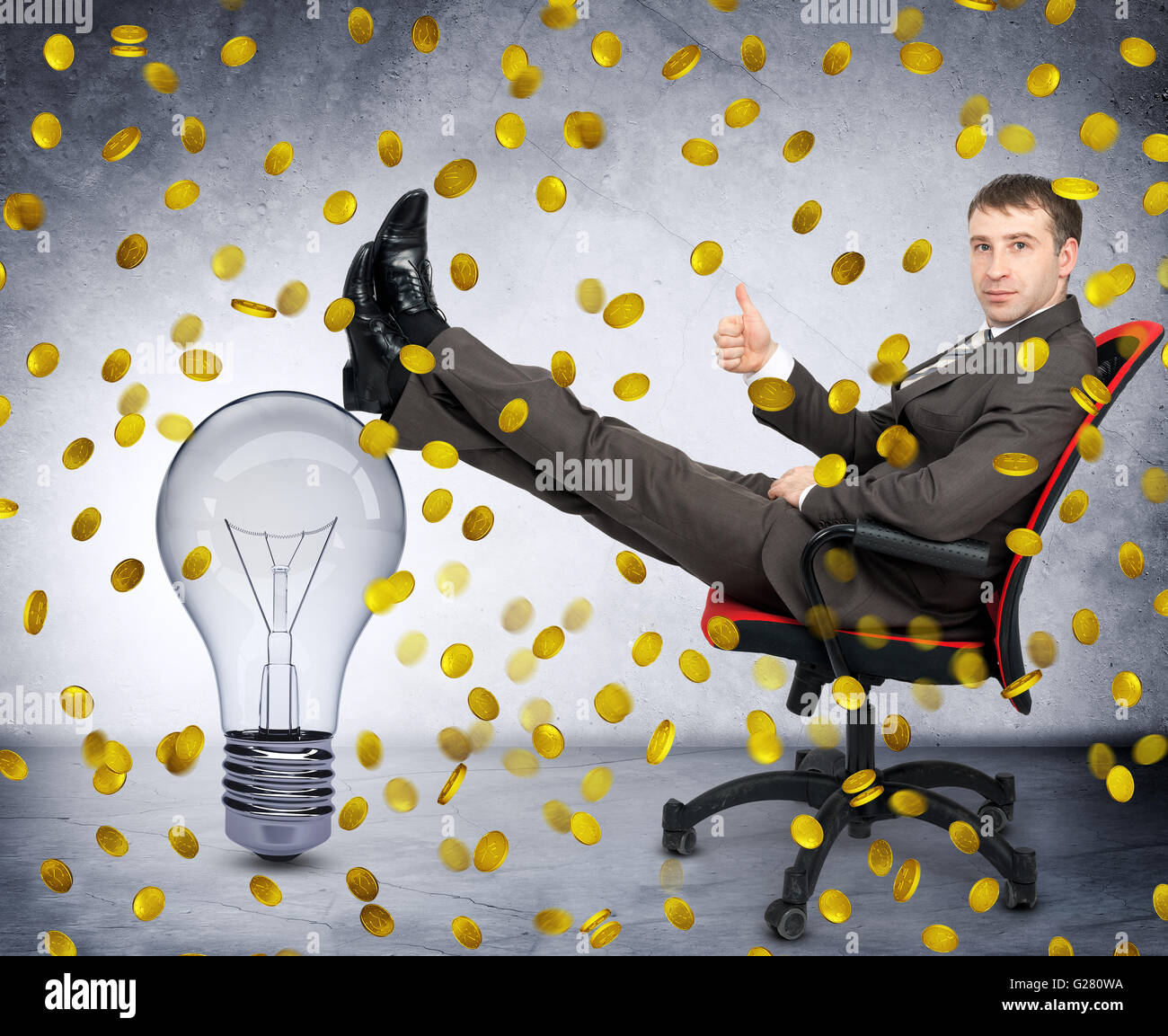 Businessman with light bulb under coin rain Stock Photo - Alamy