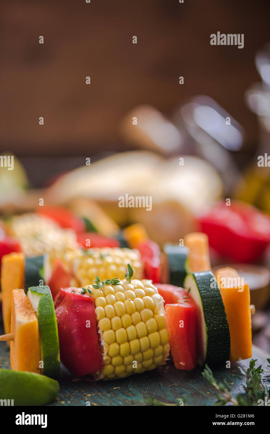 vegetable skewers, copy space wooden background Stock Photo - Alamy