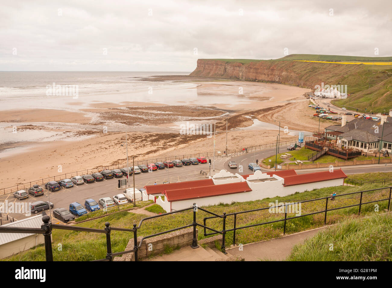 A cliff top view of the beach and Huntcliff at Saltburn by the Sea ...