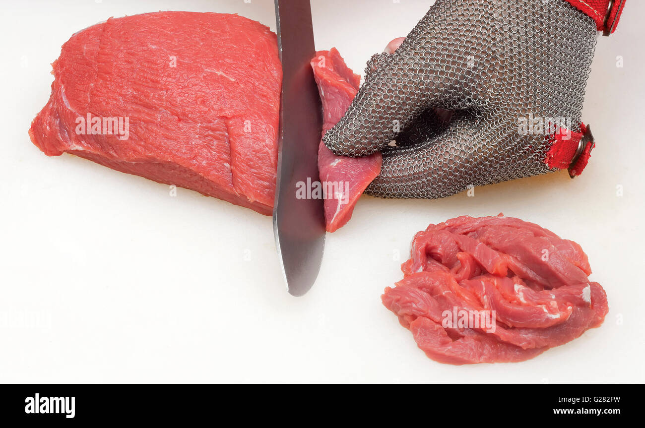 Man chopping meat at meat market hi-res stock photography and images ...