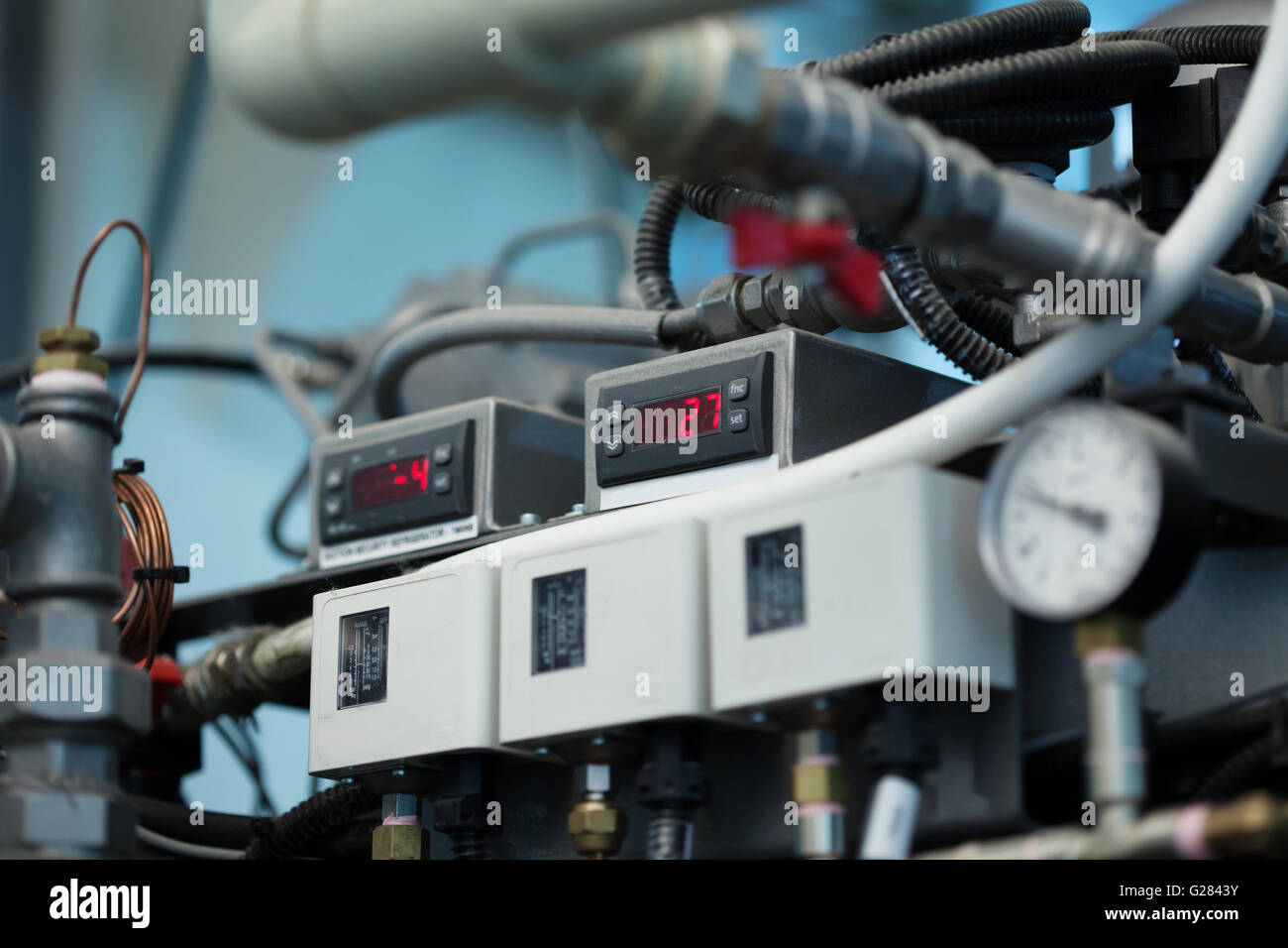 Shot of temperature indicator on automated machine Stock Photo - Alamy