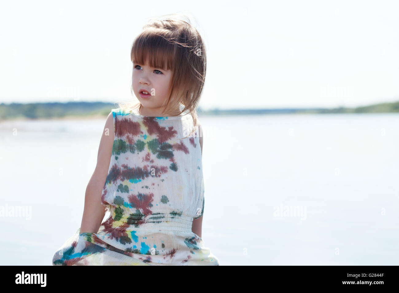 Image of pretty little model posing at lake Stock Photo - Alamy