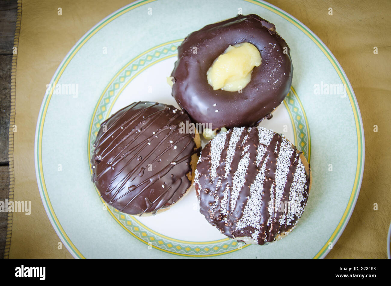 Sweet donuts for breakfast Stock Photo - Alamy