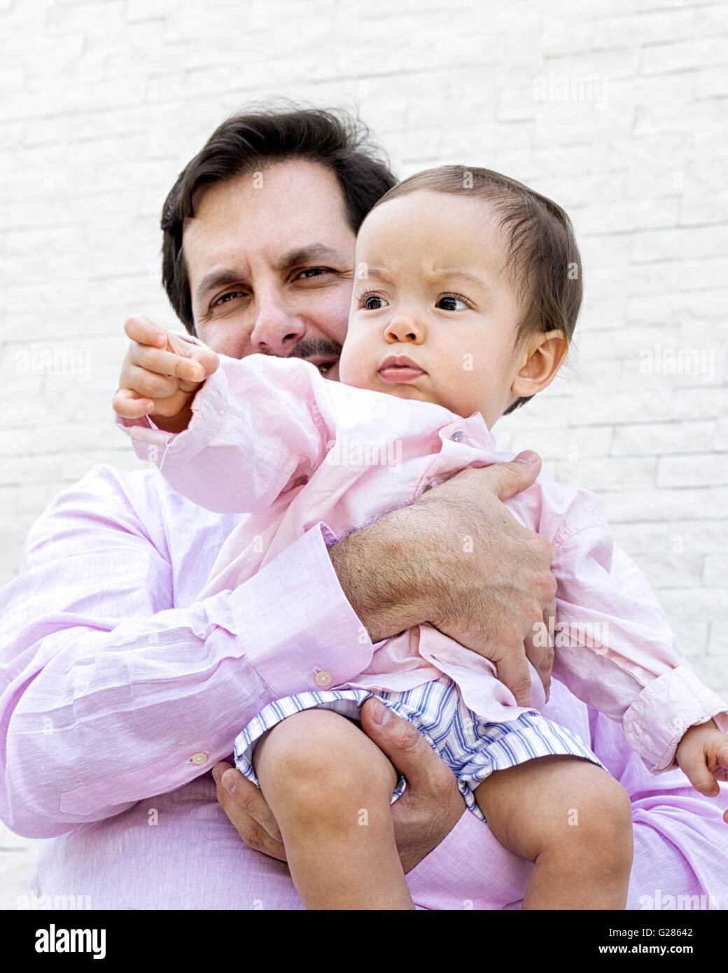 Baby father hug hi-res stock photography and images - Alamy