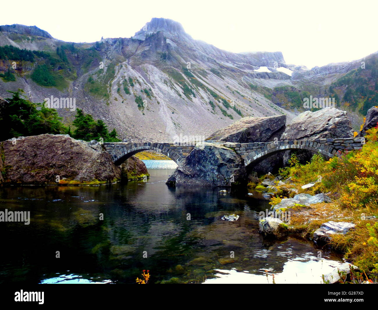 Small stone bridge with Autumn colors in Bagley lake,Mt Baker Stock ...
