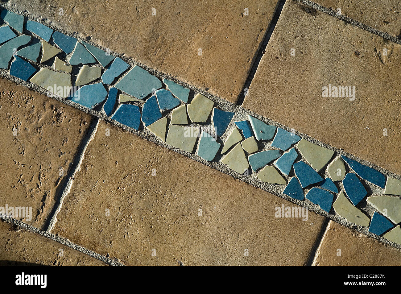 Decorative mosaic tiles in raking light Stock Photo - Alamy