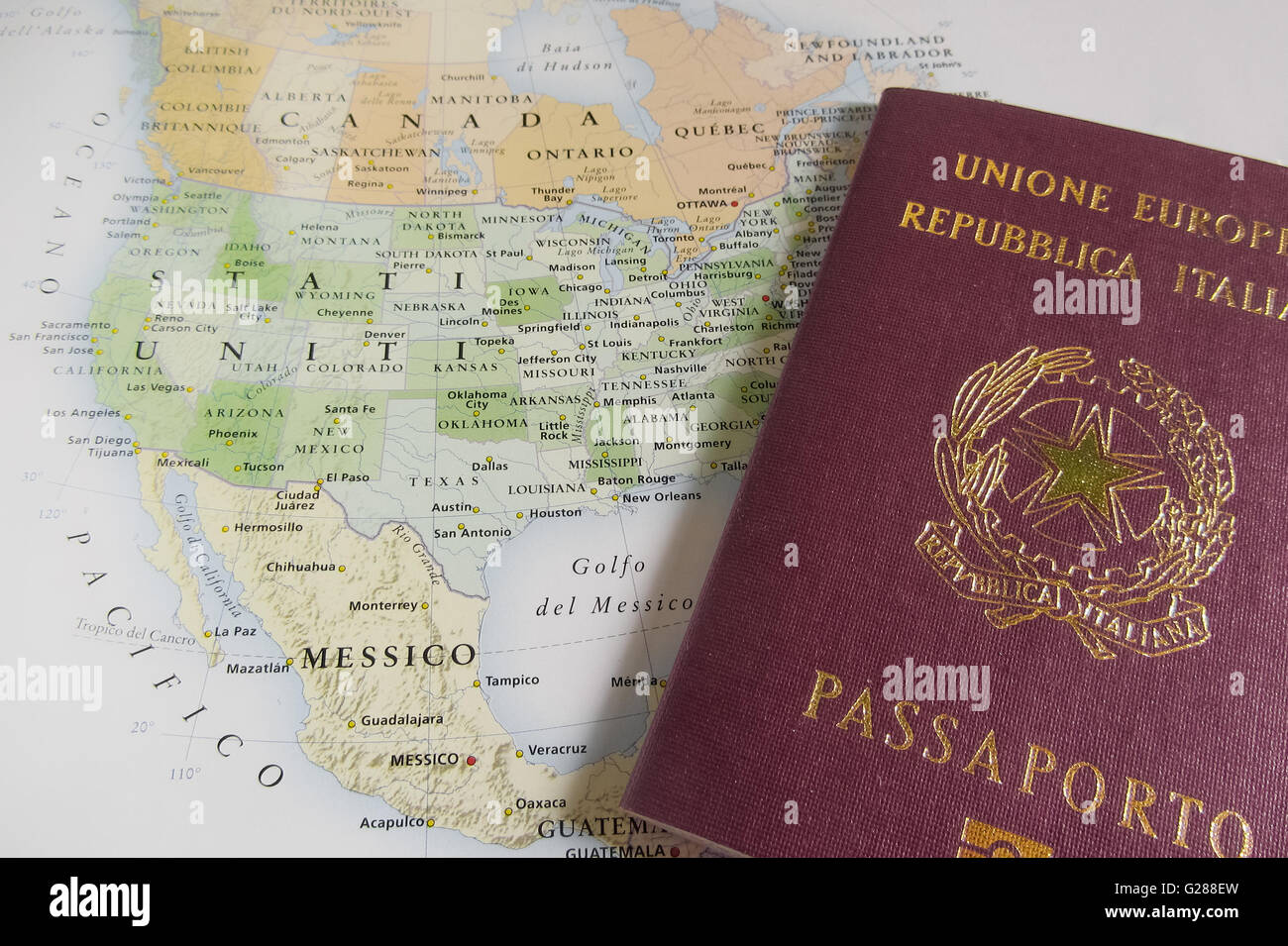Italian passport over USA map Stock Photo - Alamy