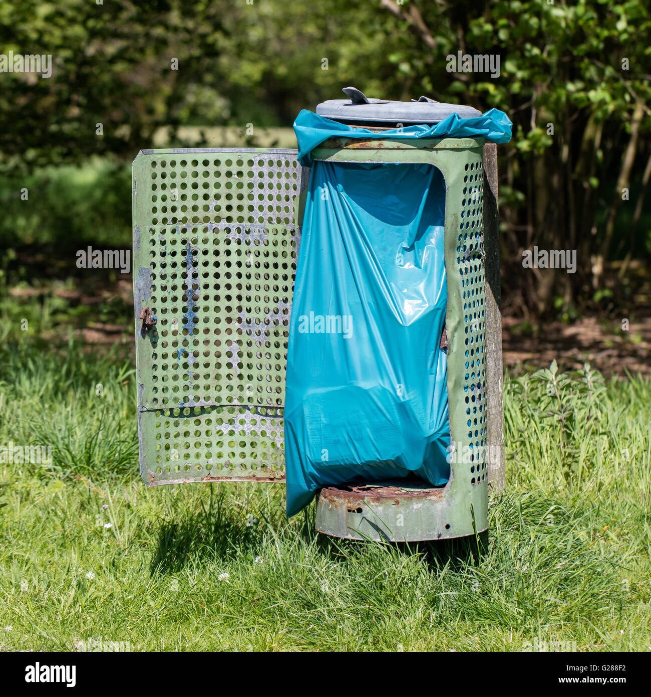 Broken litter bin in the park, the Netherlands Stock Photo - Alamy