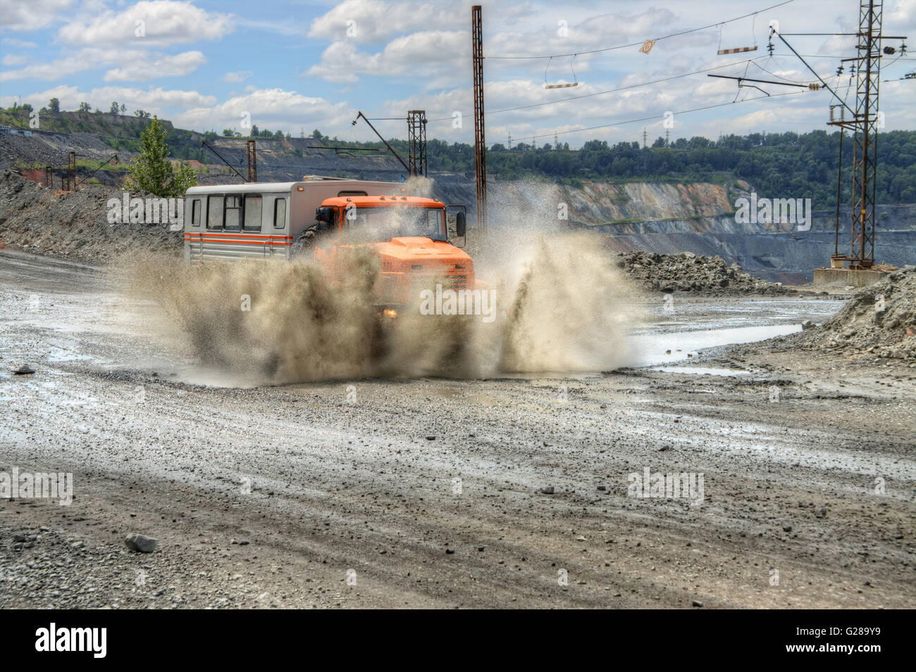 Poltava Region, Ukraine - June 26, 2010: Mining crew bus driving along ...