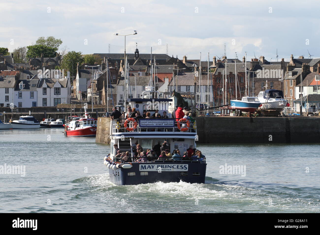 Sightseeing boat May Princess arriving Anstruther harbour Fife Scotland ...