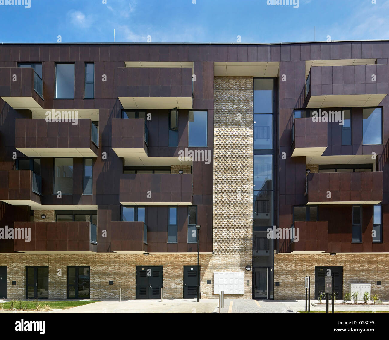 Front facade elevation made of brick and wooden veneer. Alpine Place ...