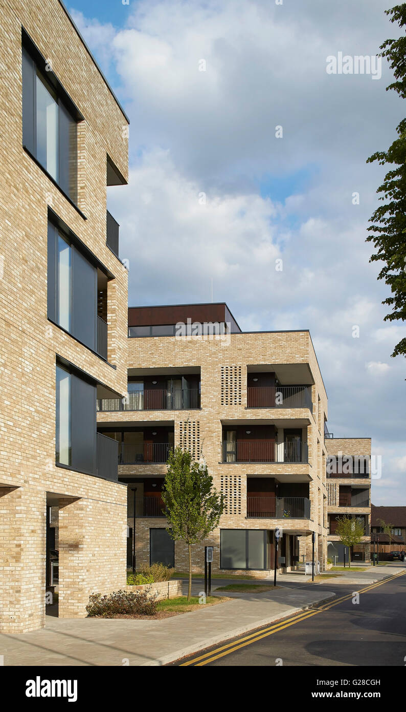 Brick facade with corner balconies. Alpine Place, Brent, London, United ...