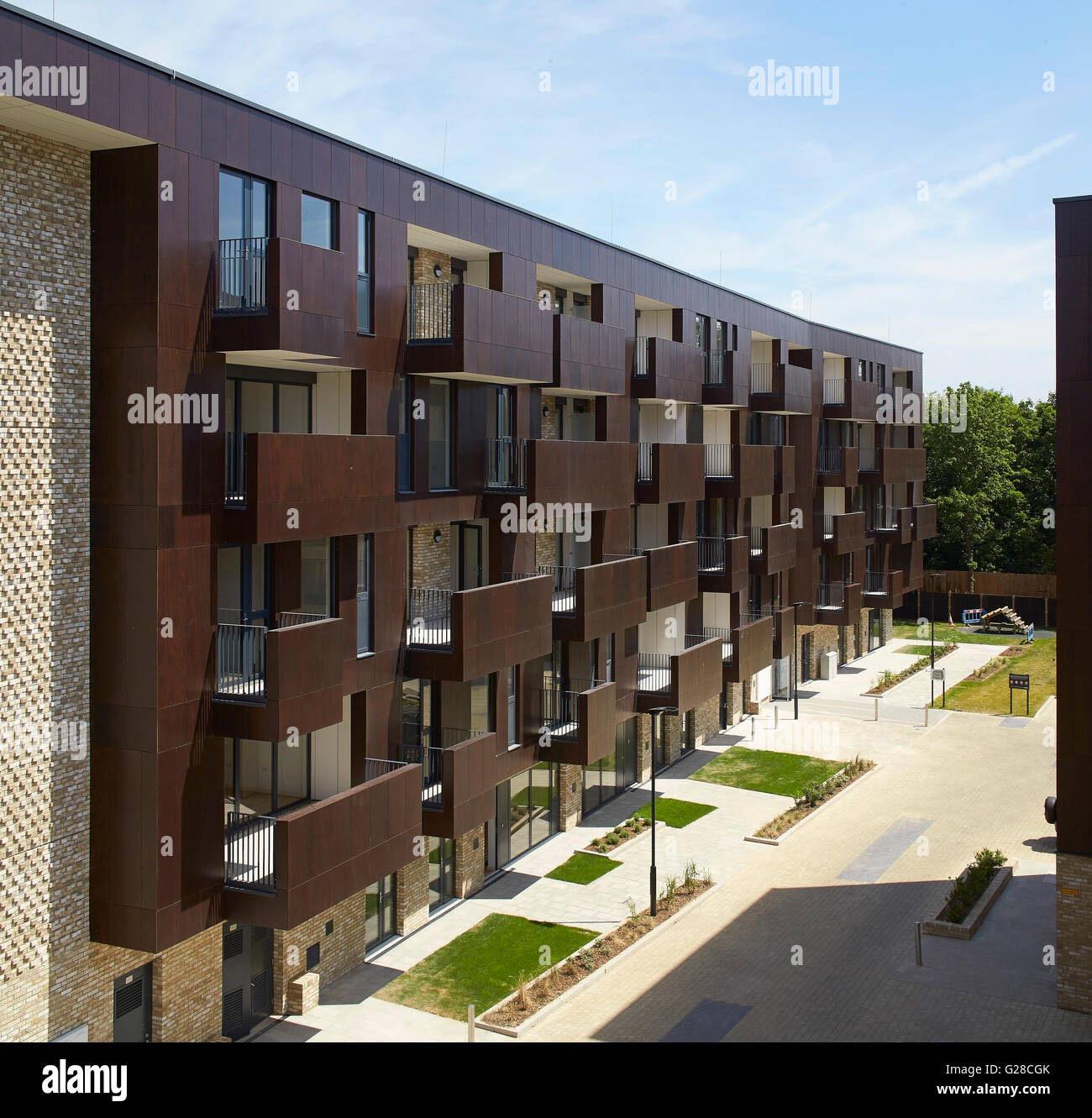 Elevated view along wooden paneling of housing block. Alpine Place ...