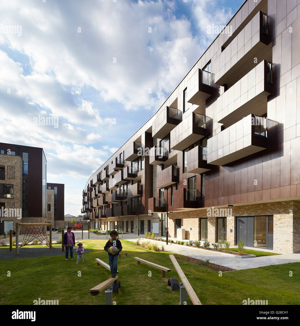 Landscaped playground and view of building complex. Alpine Place, Brent ...