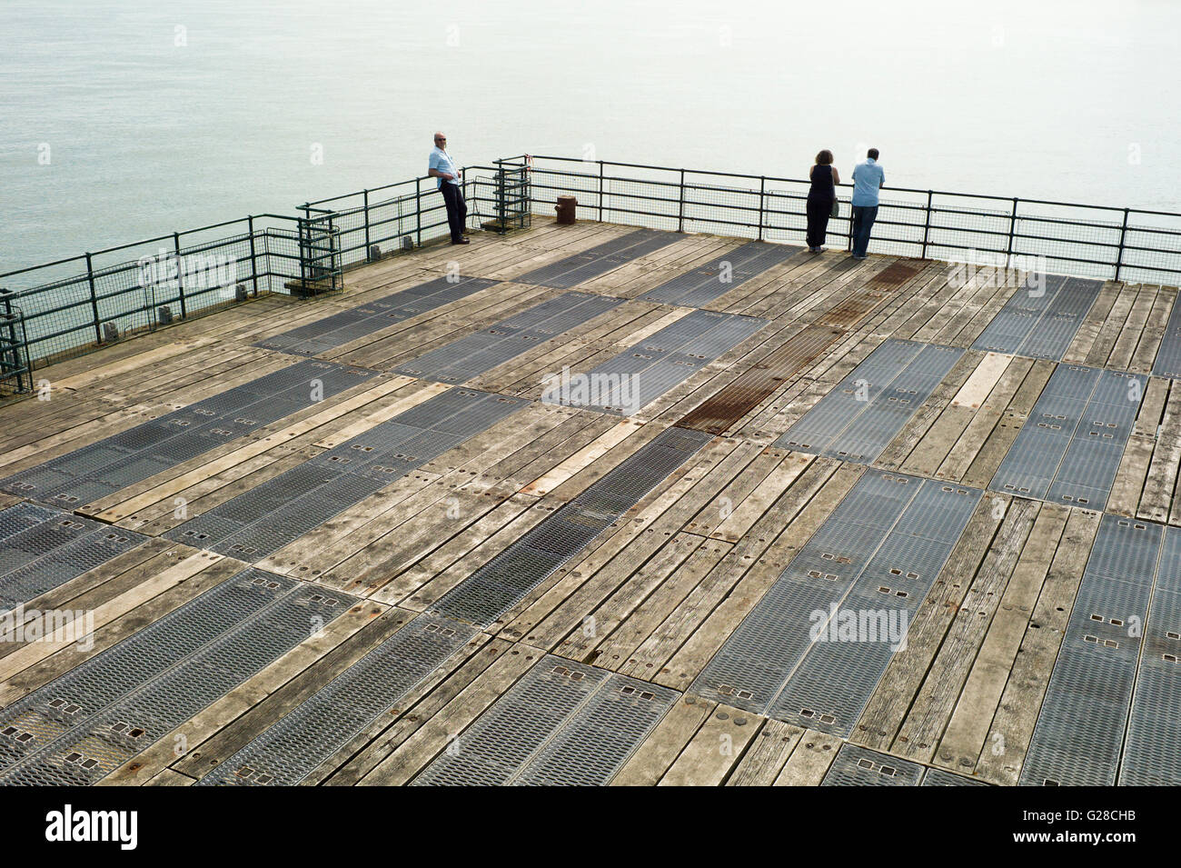 People standing at the end of the Pier Stock Photo - Alamy