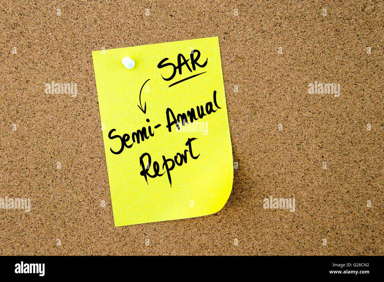 Business Acronym SAR as Semi-Annual Report written on yellow paper note ...