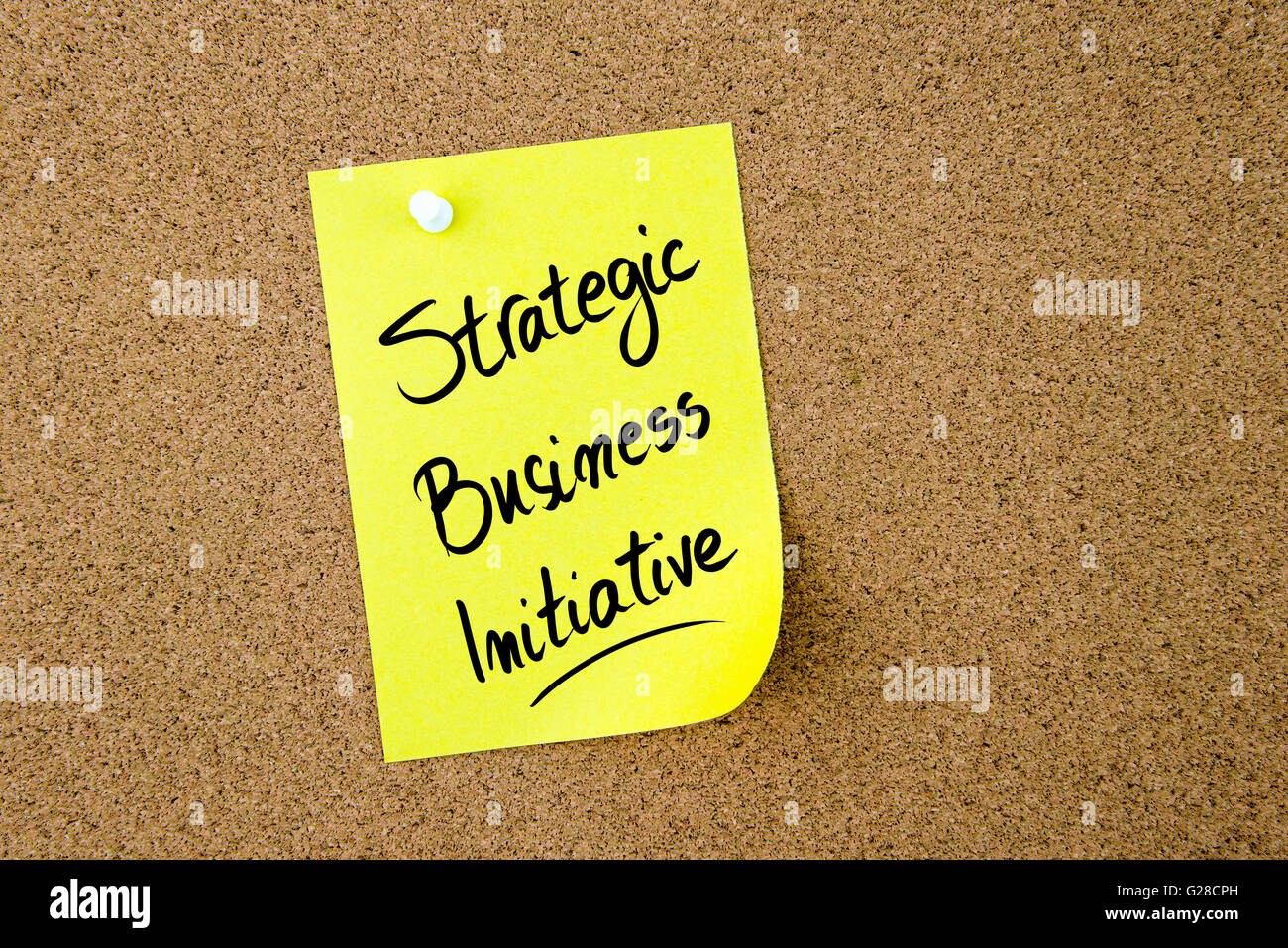 Strategic Business Initiative written on yellow paper note pinned on ...