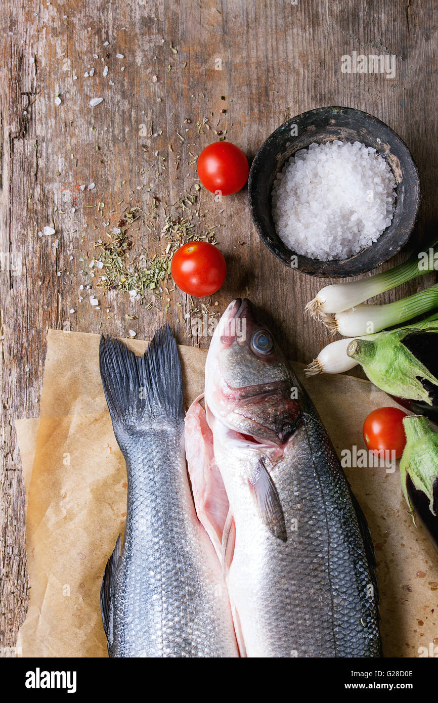 Raw seebass fish Stock Photo - Alamy