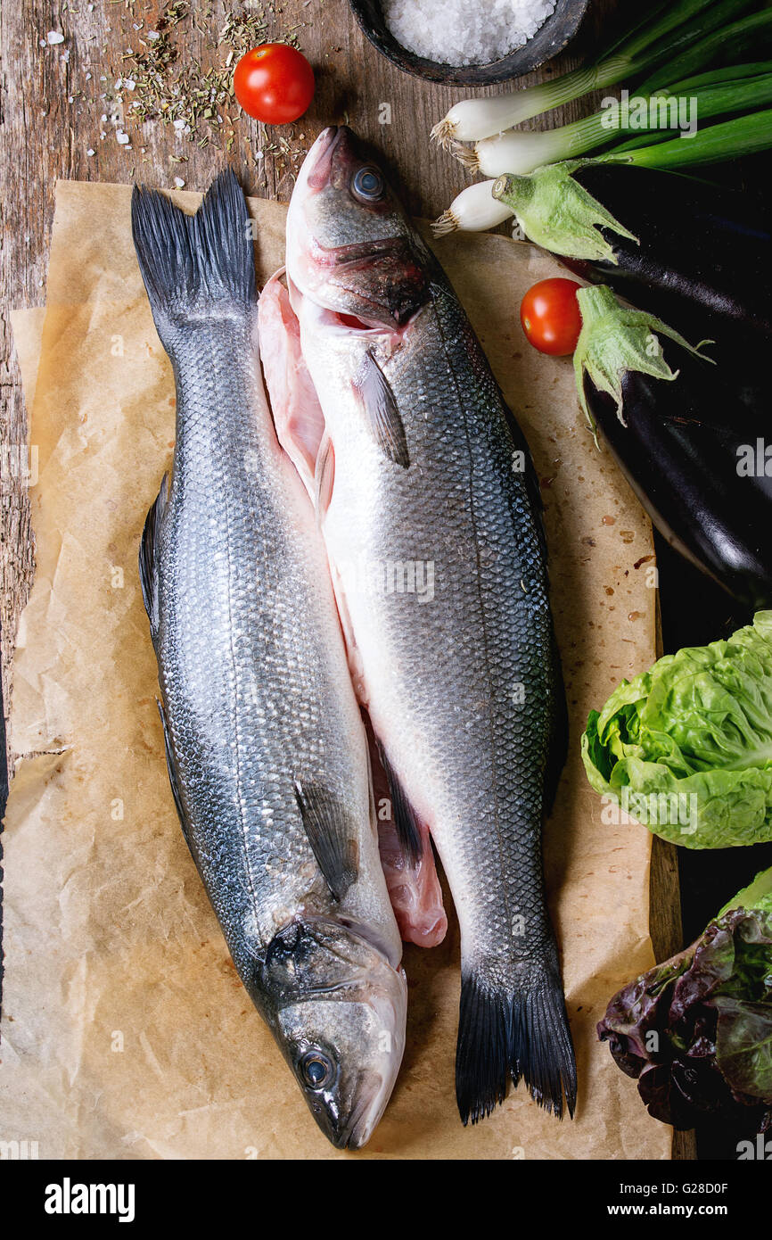Raw seebass fish Stock Photo - Alamy