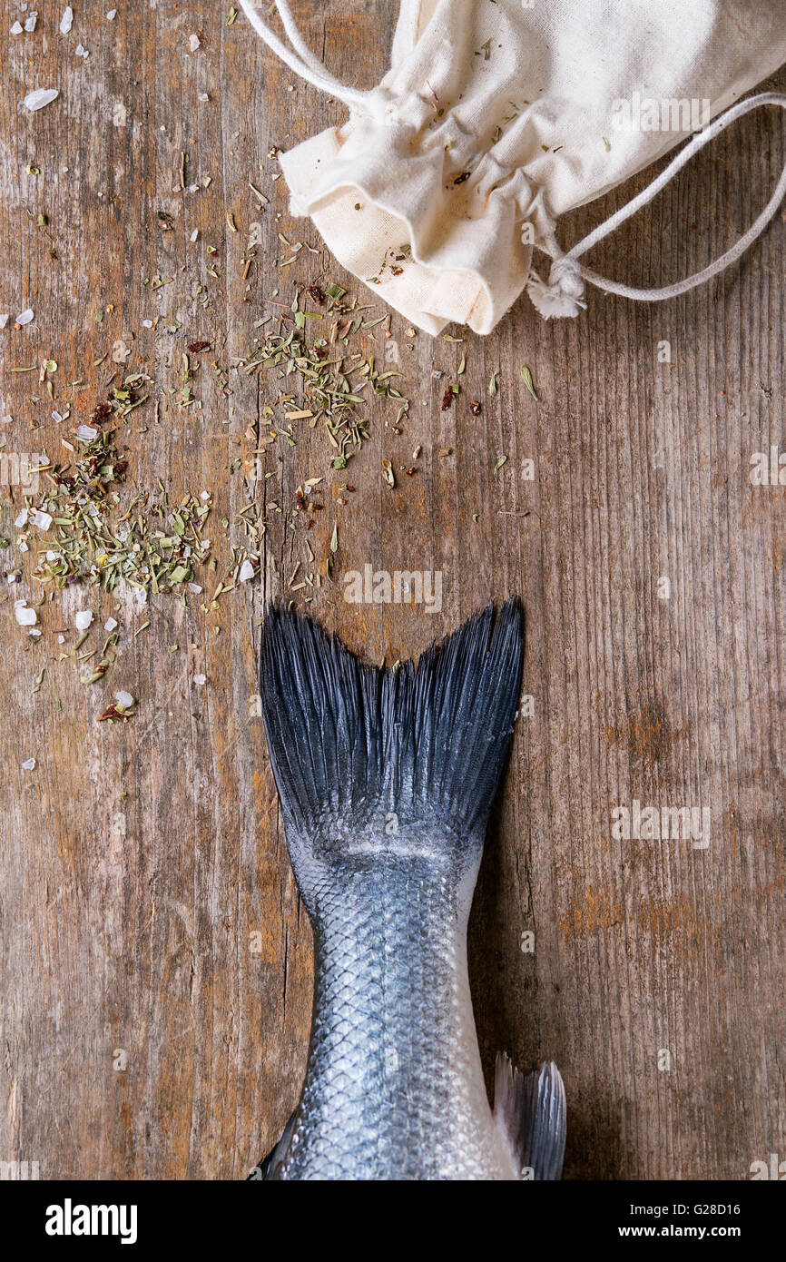 Raw seebass fish Stock Photo - Alamy