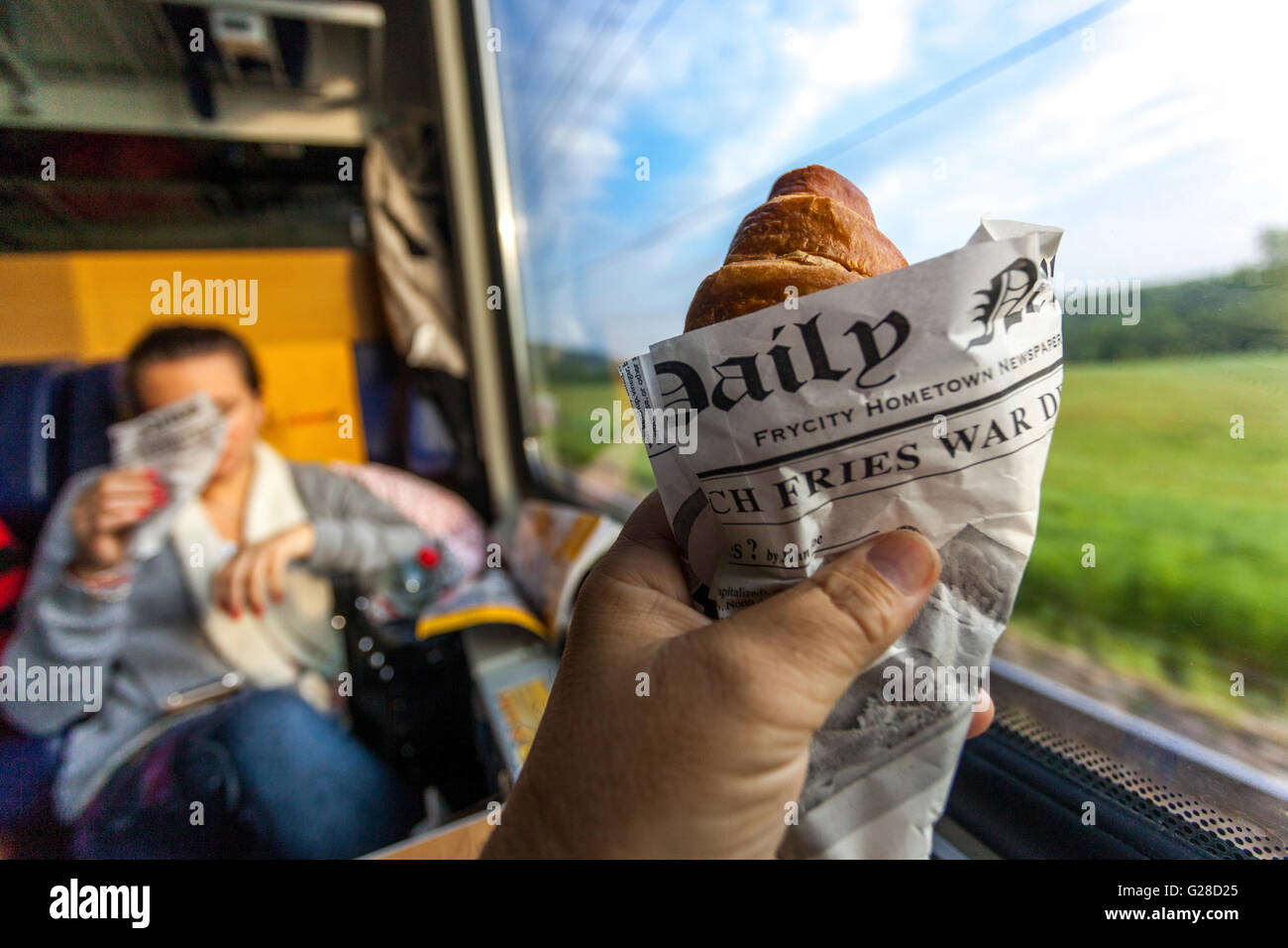 Fresh croissants, snacks in food train eating Stock Photo - Alamy