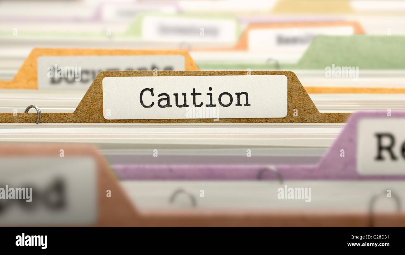 File Folder Labeled as Caution Stock Photo - Alamy